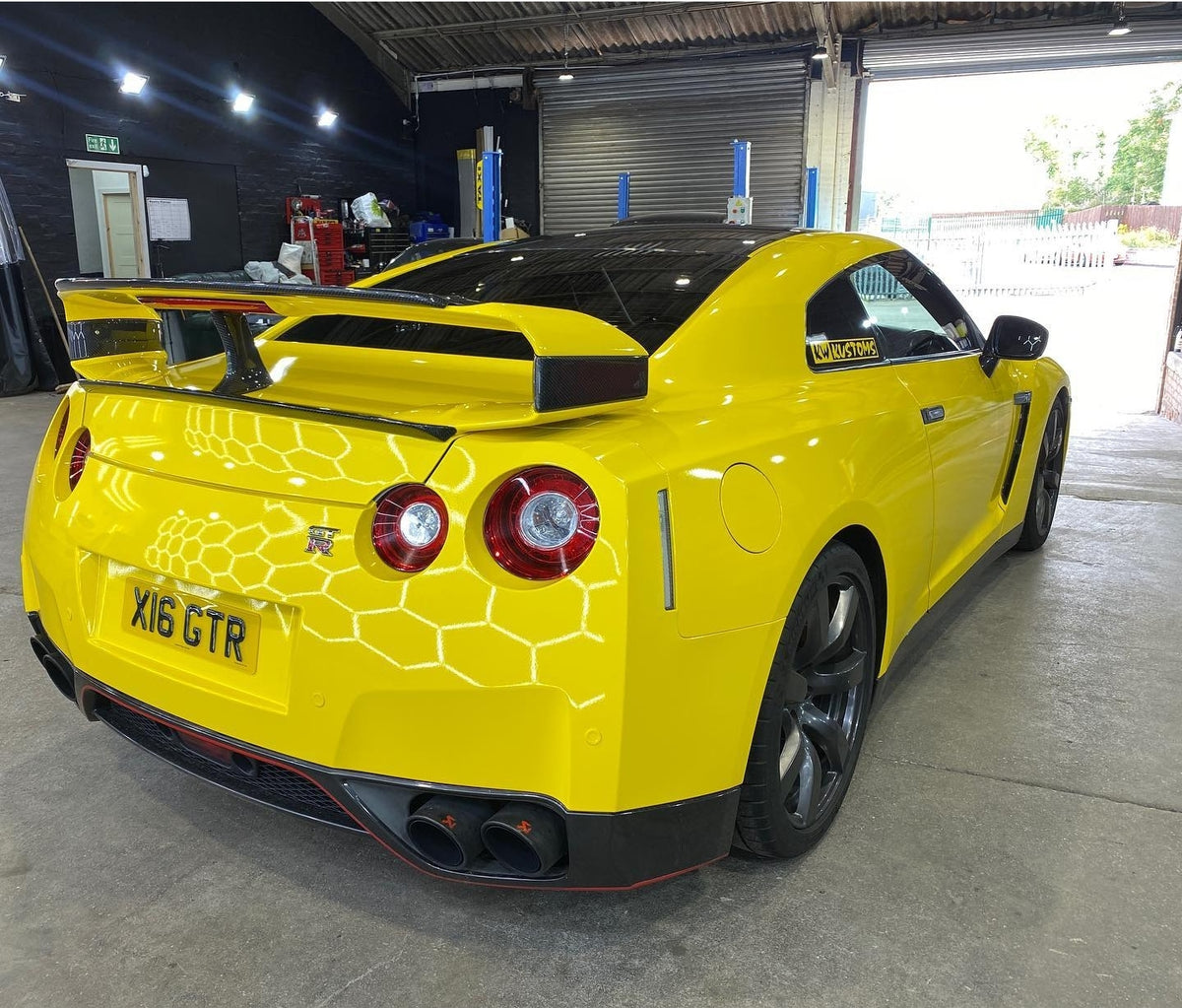 Yellow wrapped Nissan GTR with some 3D gel plates – PL8 LAB